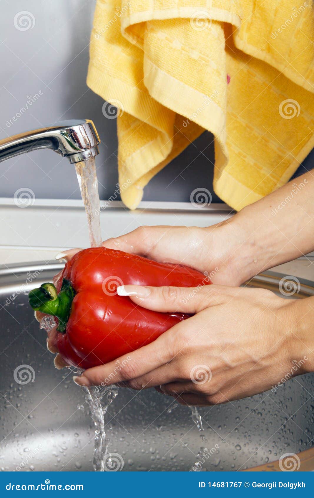 Washing a paprika stock image. Image of food, organic - 14681767