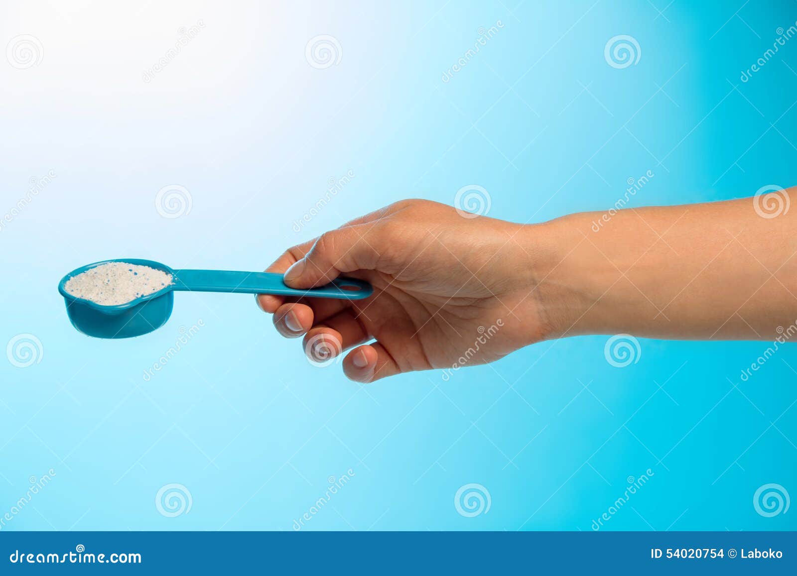 Washing Powder in Hand with Measuring Cup Stock Photo - Image of powder ...