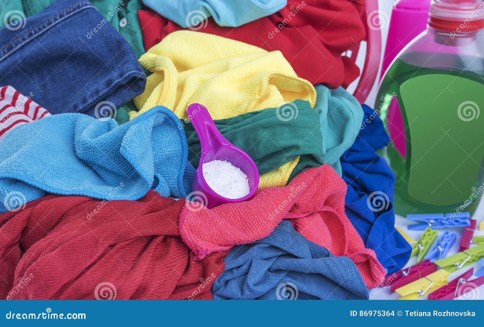 Washing Powder and a Pile of Dirty Laundry. Stock Photo - Image of ...