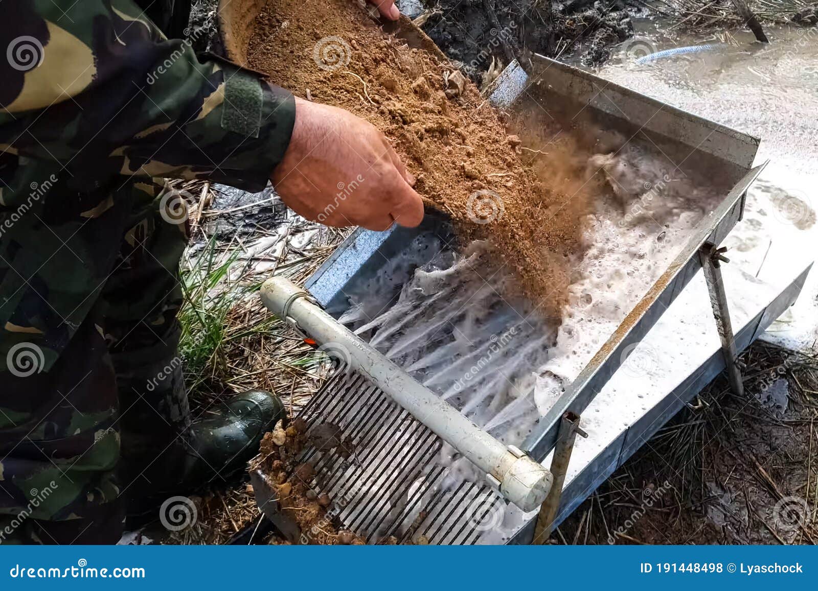Washing Rock Containing Gold. Search and Extraction of Gold Stock Photo ...