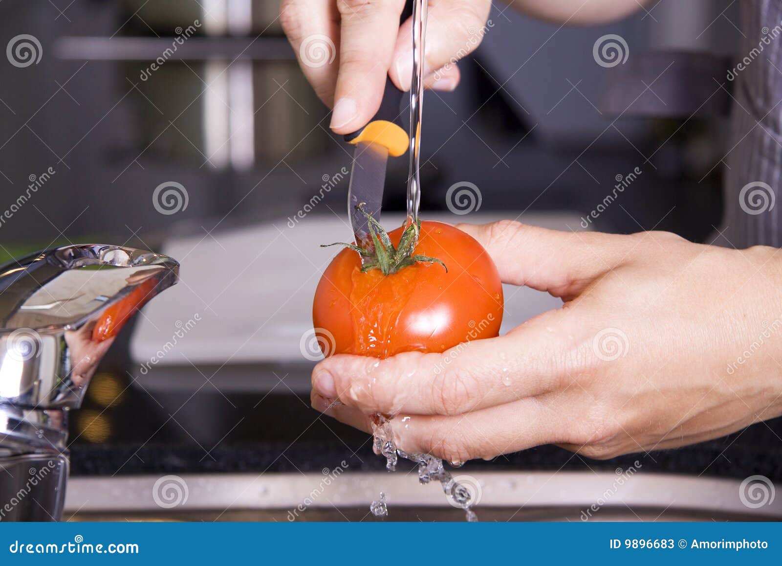 Washing a tomato stock image. Image of closeup, health - 9896683