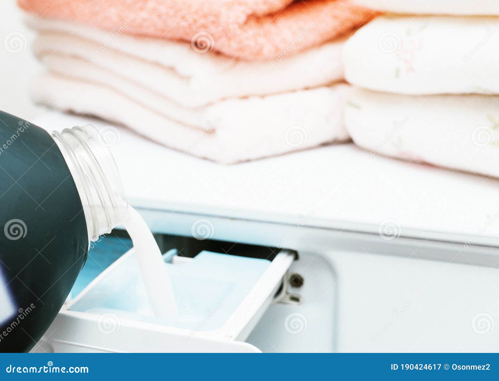Washing Towels and Cotton Clothes in the Washing Machine. Add Detergent ...