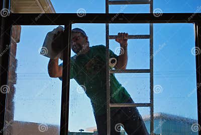 Washing windows stock image. Image of clean, reaching - 11783005