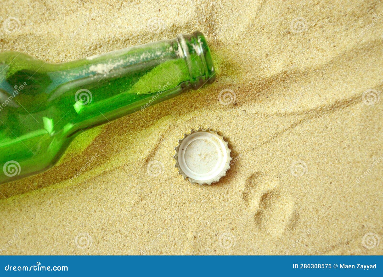 Empty Bottle with Cap Left on the Beach Stock Image - Image of ...