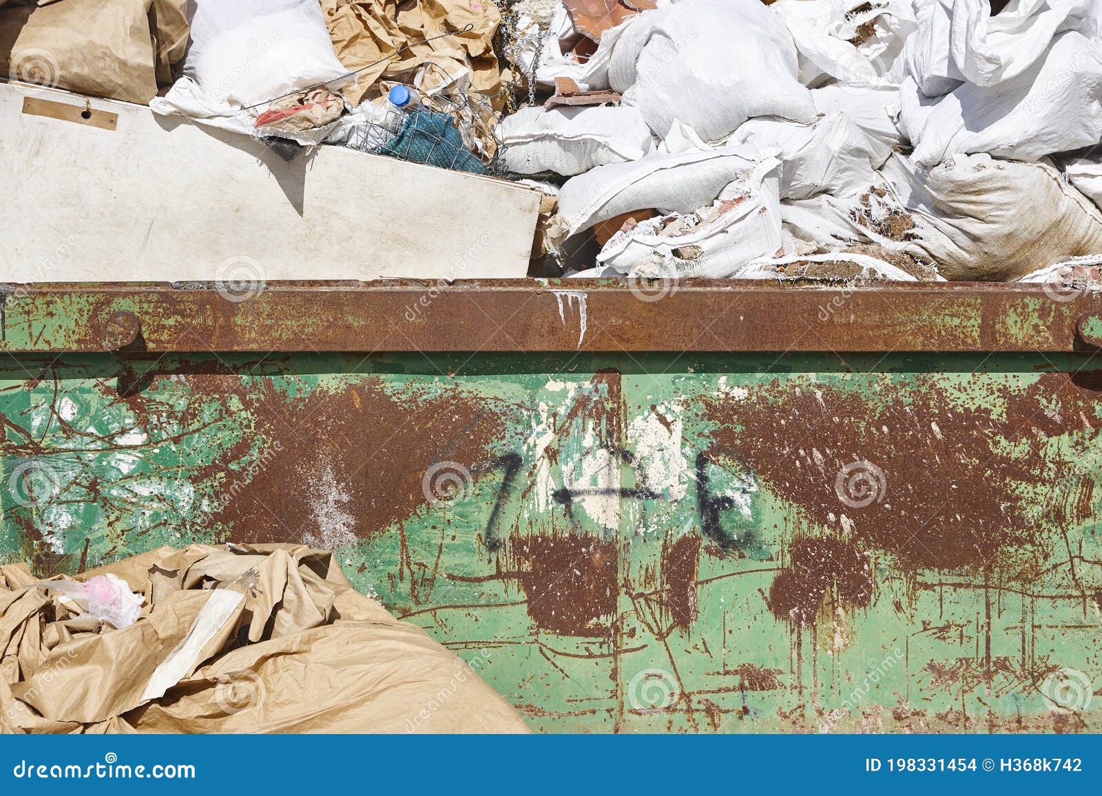 Waste Container Full of Garbage and Debris. Rubbish Recycling Stock ...