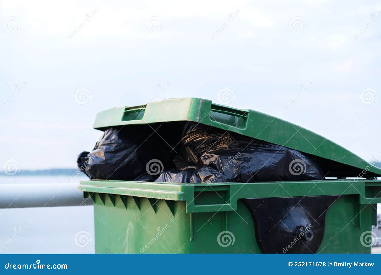 Waste Container Made of Plastic Overflowing with Waste. Close-up Stock ...