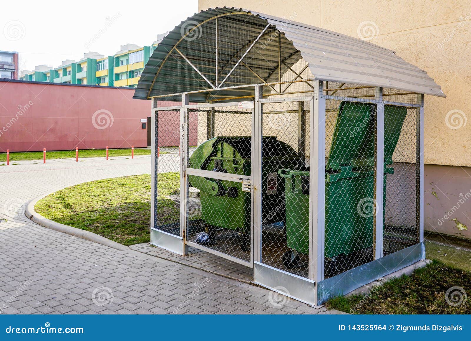 Waste Containers are Placed in a Metal Wire Mesh Shed with a Code Key ...