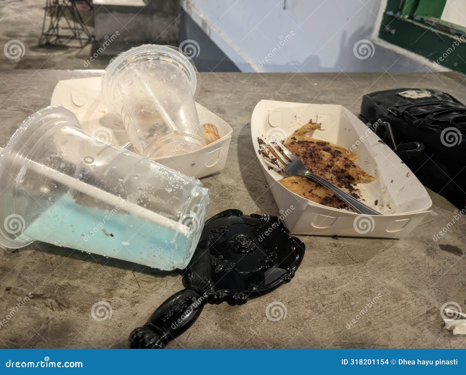 Waste of Drink Cups and Food on the Table Which is Still Cemented Stock ...