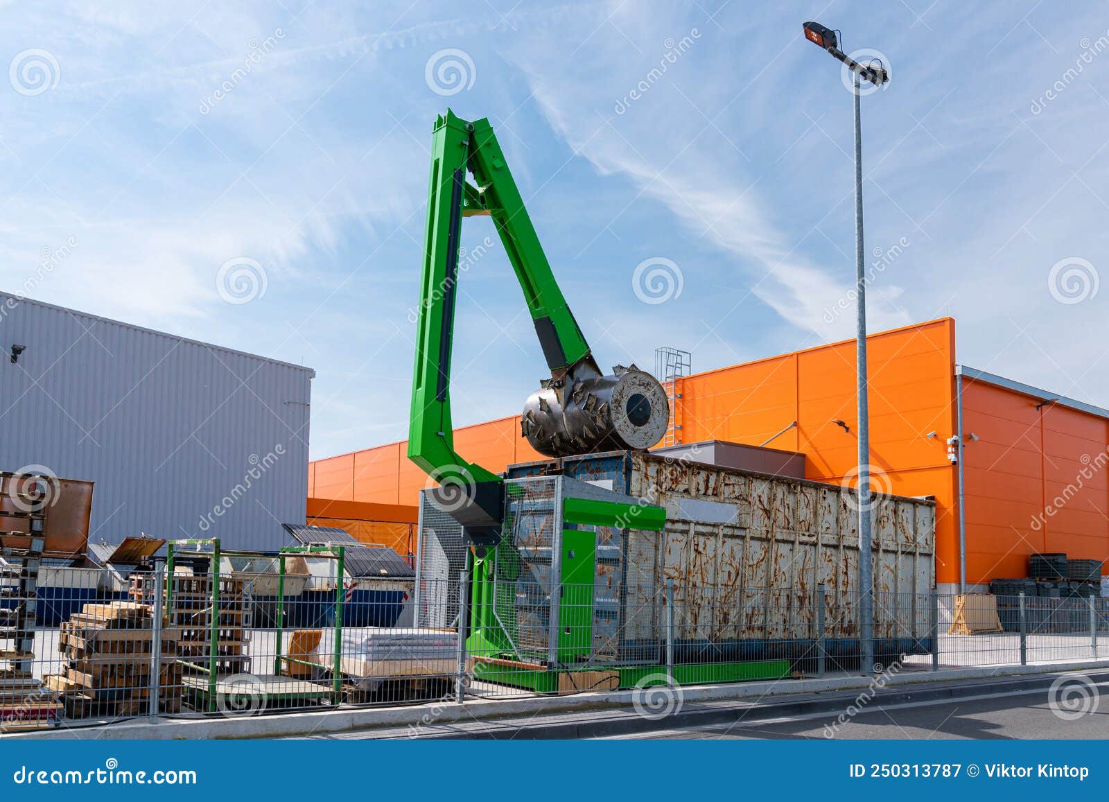 Waste Garbage Compactor Working on a Dumpster Bin. Recycle Machine ...