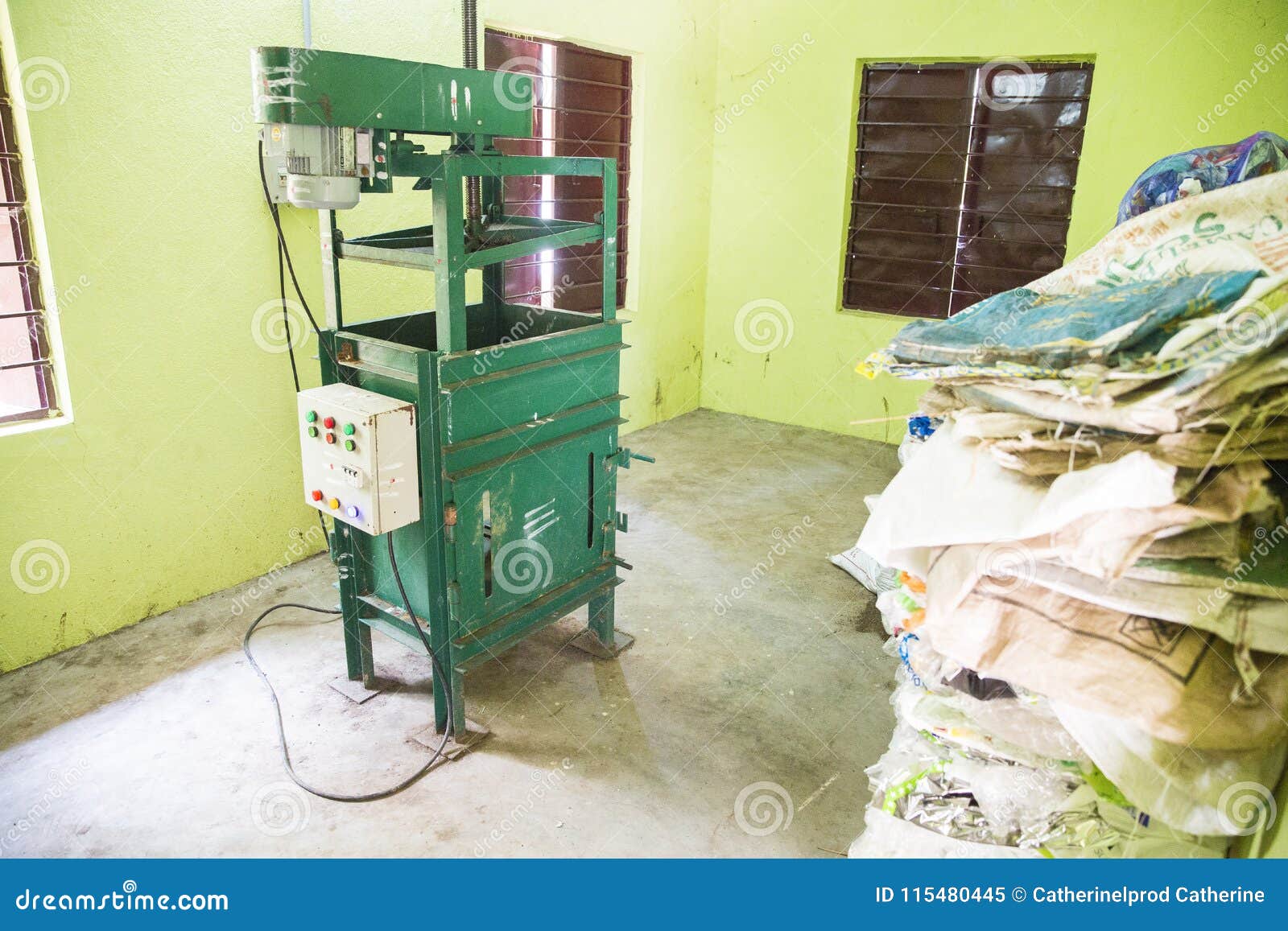 Waste Garbage Plastic Bottles Bags Compressed by Machine Stock Image ...