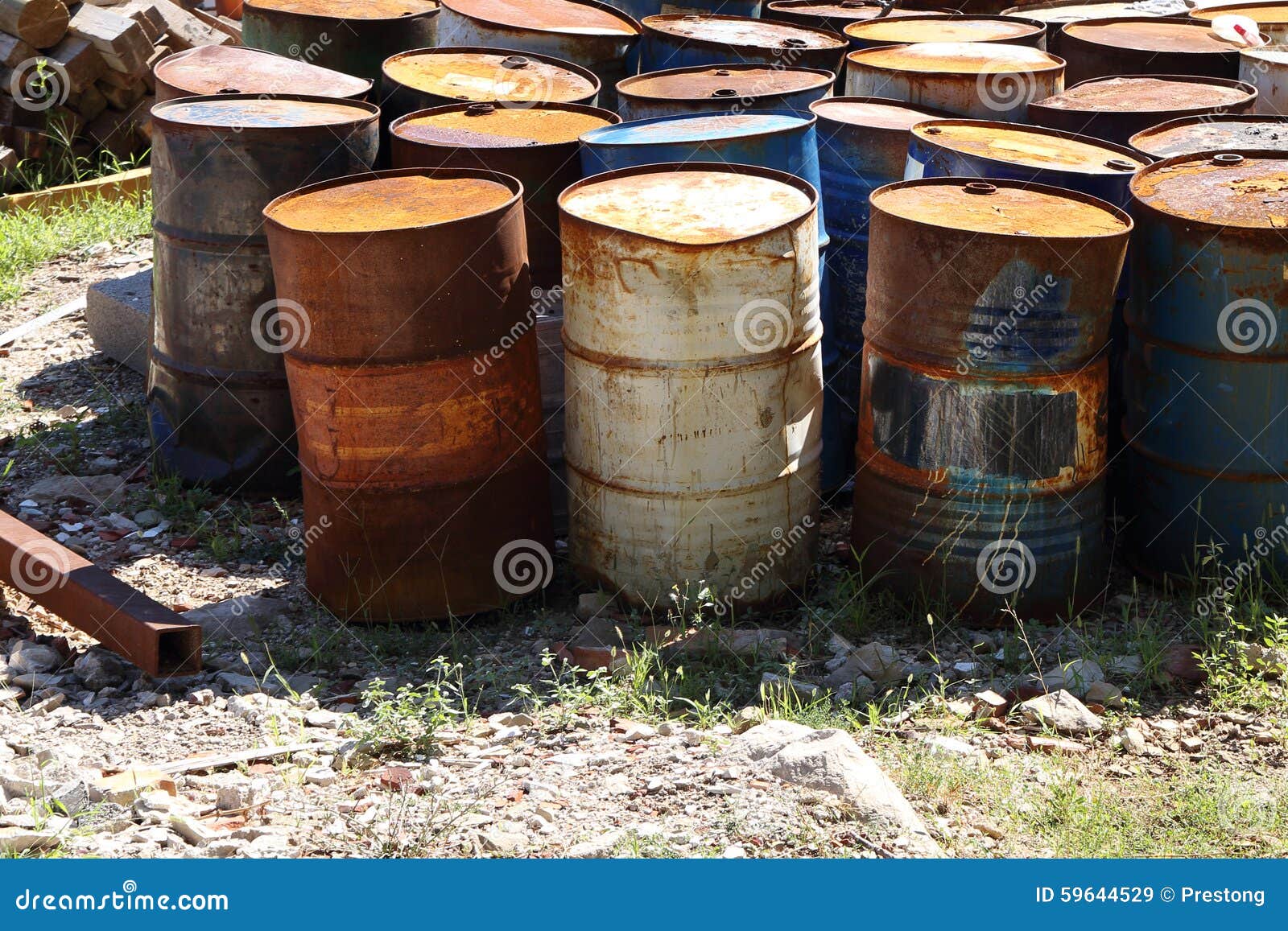 Waste Ground with Rusting Oil Drums. Stock Image - Image of showing ...