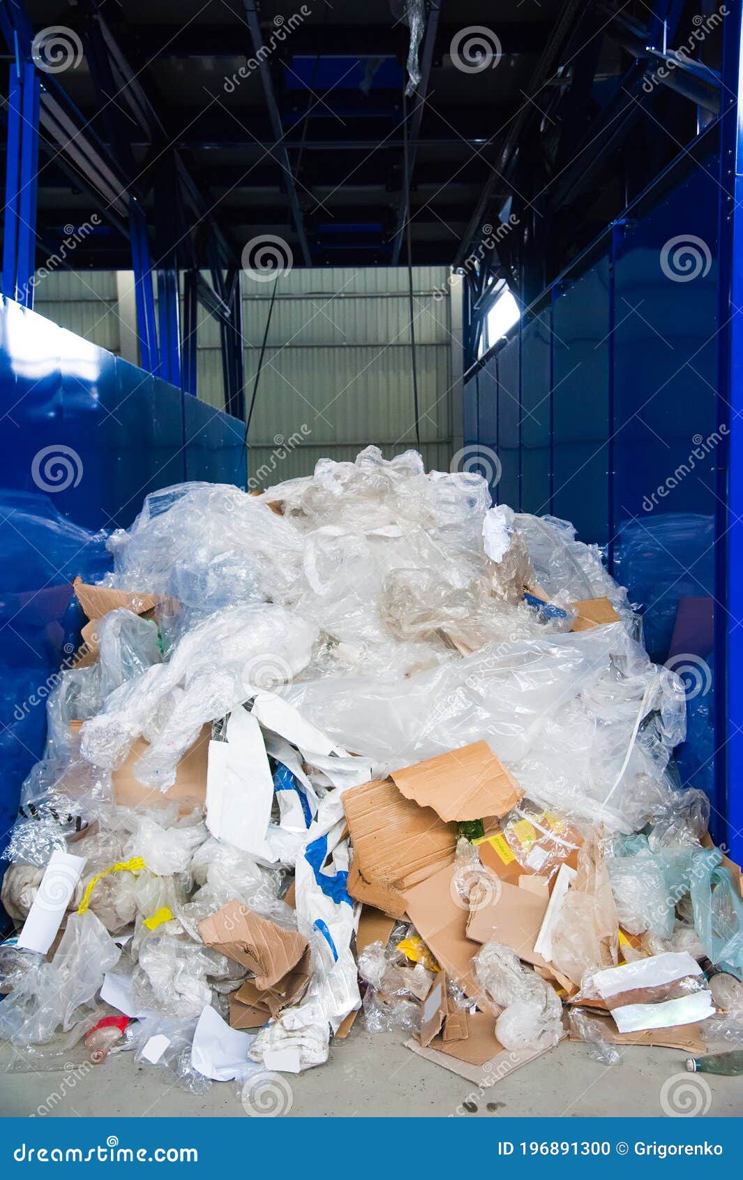 Waste recycling factory stock photo. Image of manufacturing - 196891300