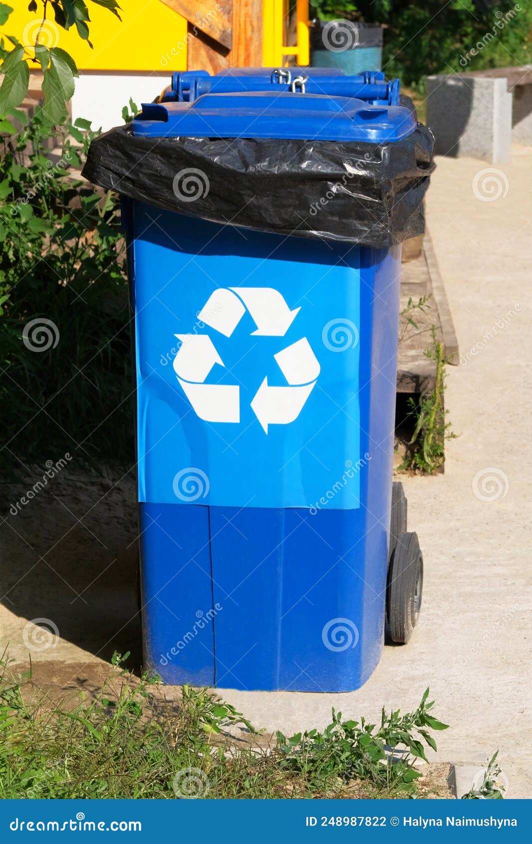 Waste Recycling Concept. Blue Containers for Further Processing of ...