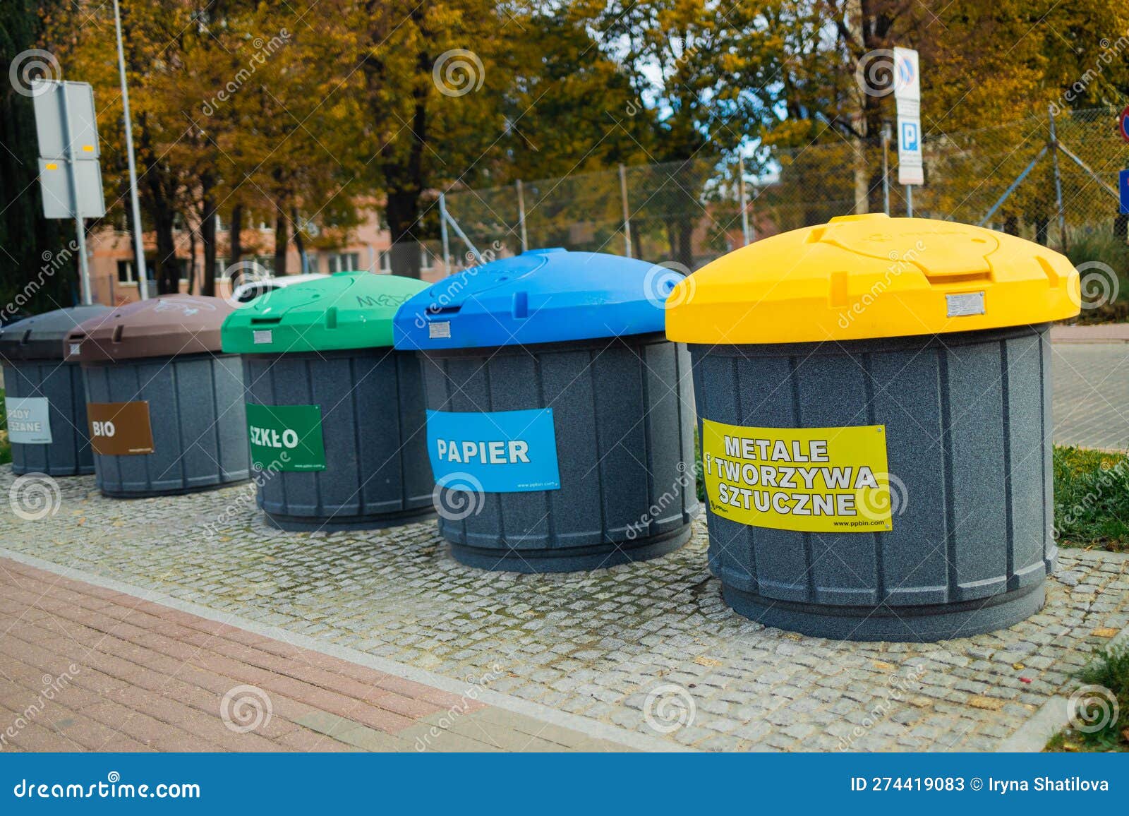 Waste Sorting Bins, Blue, Yellow, Green and Red. There is a Sign at the ... Waste Sorting Bins, Blue, Yellow, Green and Red. There is a Sign at the ...