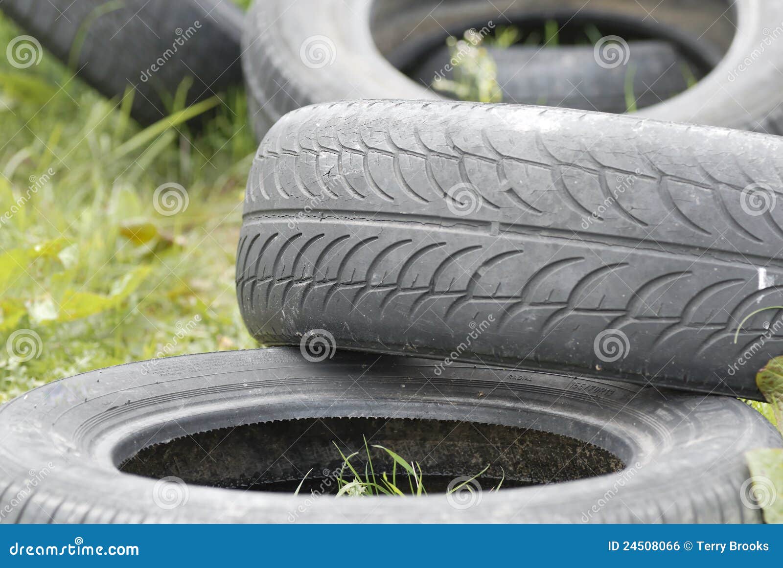 Dumped Car Tyres. Fly-tipping Old Tyre Waste And Rubber Recycling ...
