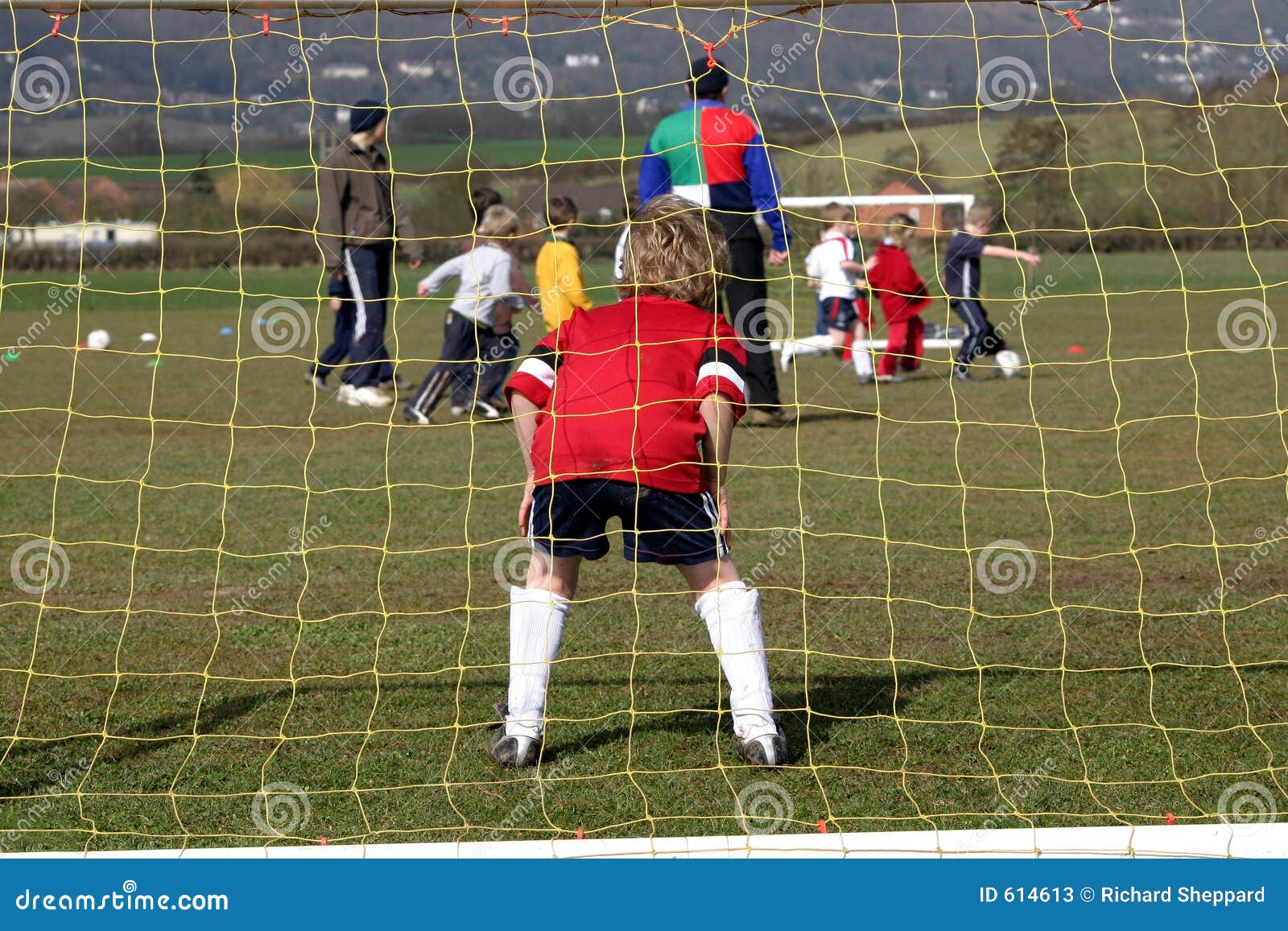 Watch the ball stock image. Image of child, player, keeper - 614613