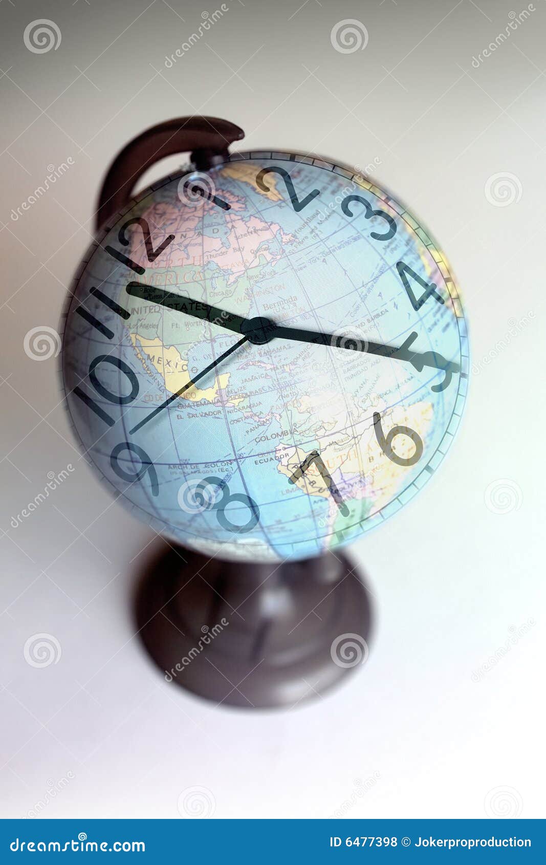 Watch in a globe stock photo. Image of business, measuring - 6477398
