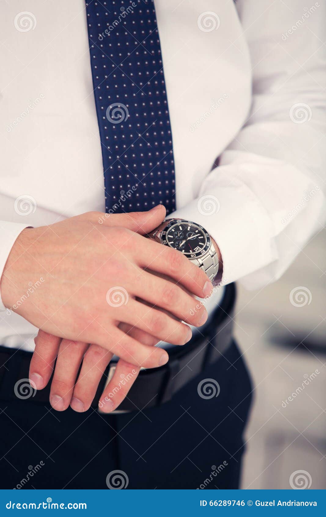 Watch on a hand at the man stock photo. Image of cuff - 66289746