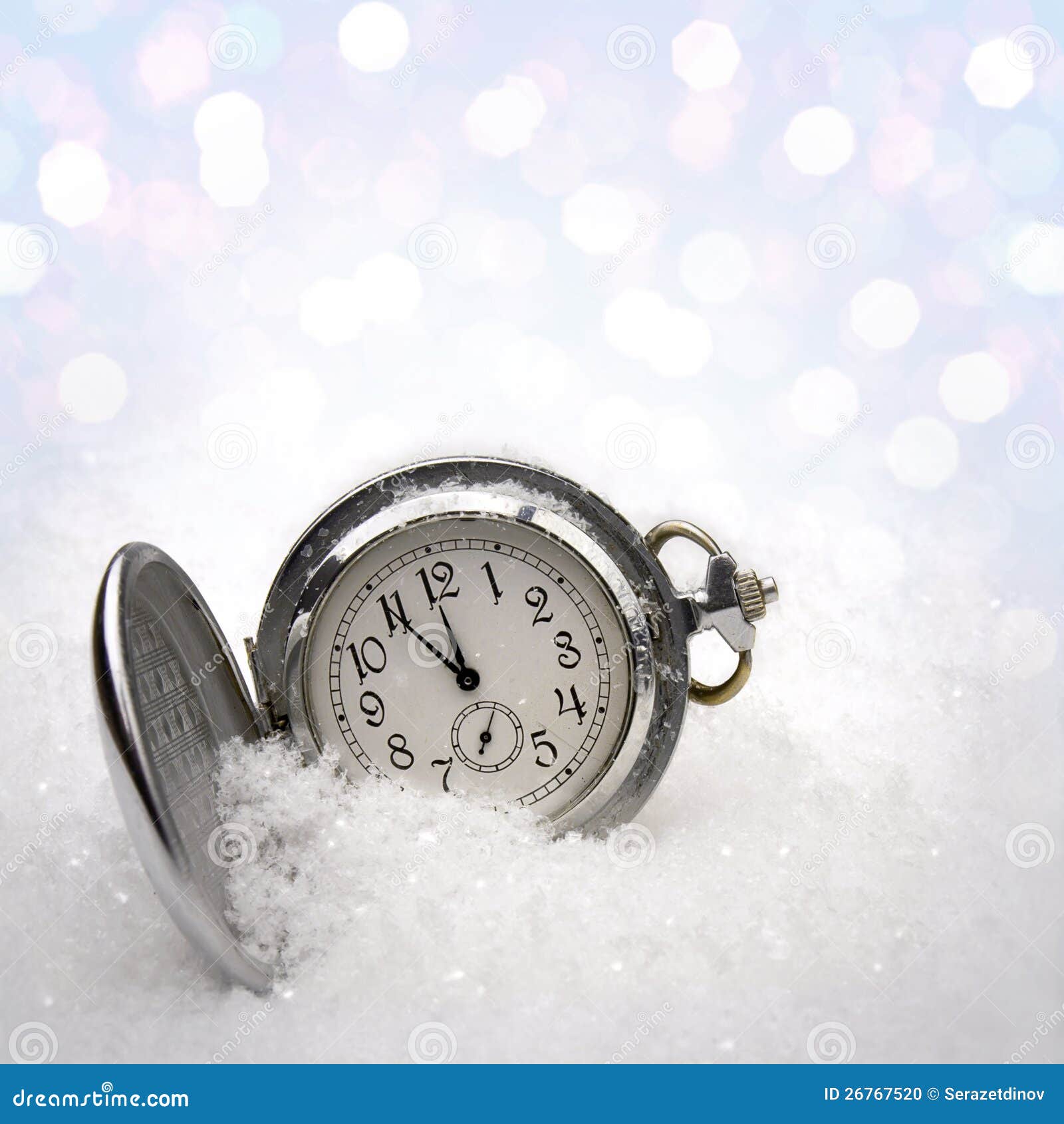 Watch lying in the snow stock photo. Image of season - 26767520