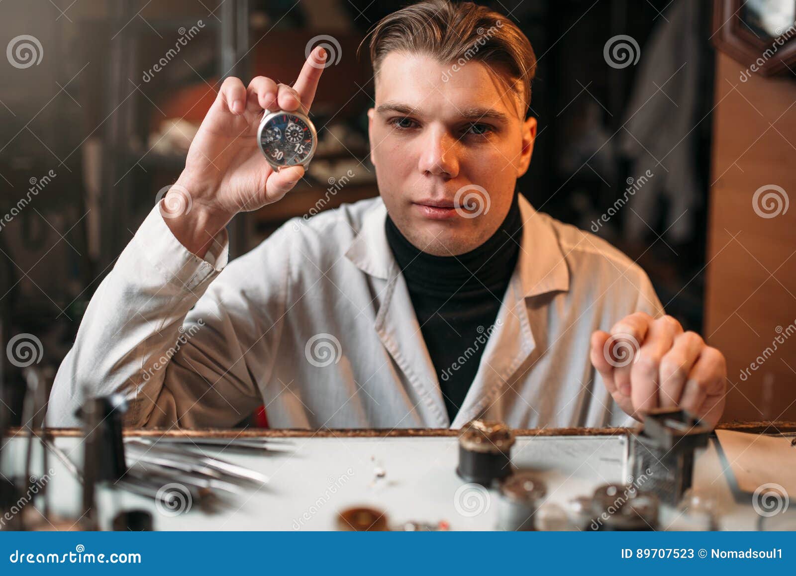 Watch Maker Holding Wrist Watch in Hand Stock Image - Image of holding ...