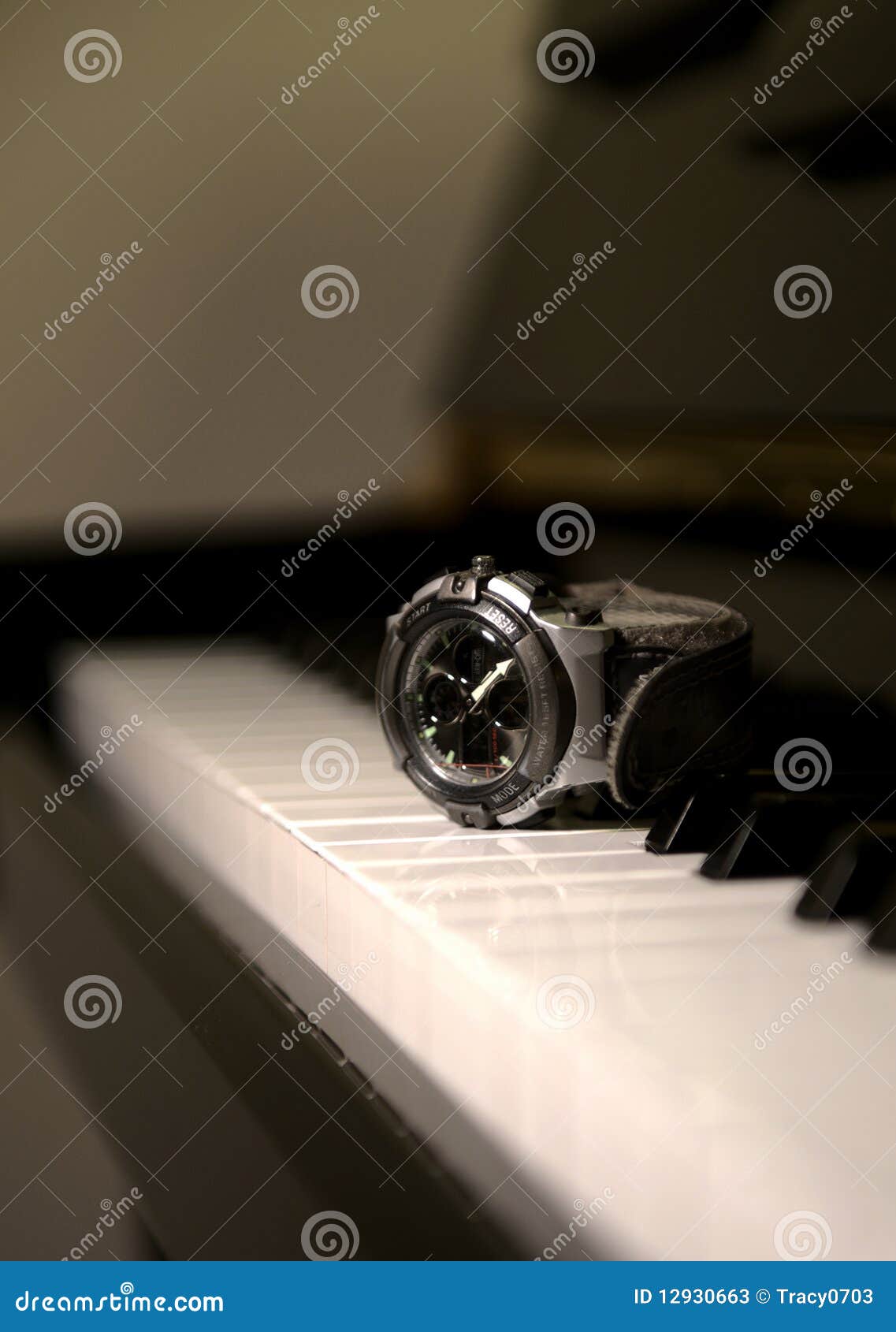 Watch on piano stock image. Image of watch, misic, time - 12930663
