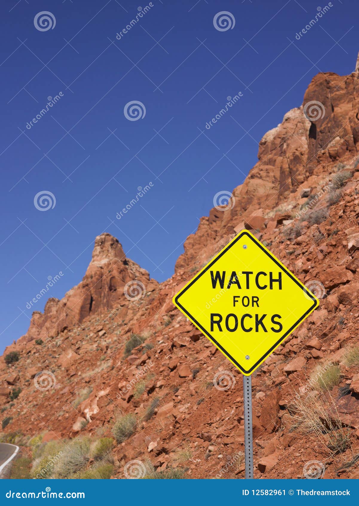 Watch for Rocks Sign Next To Highway Stock Image - Image of sign ...