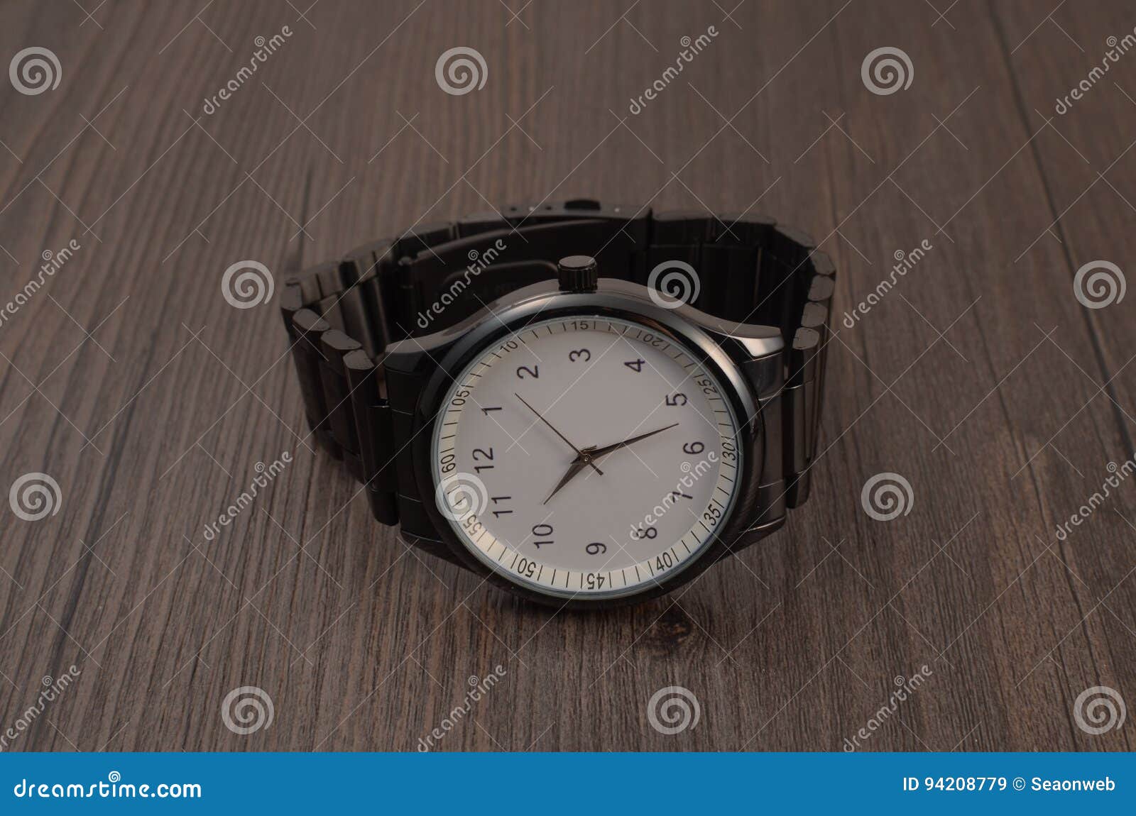 Watch on a wooden floor stock image. Image of chronometer - 94208779