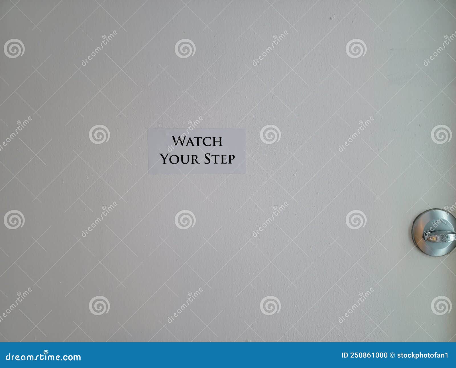 Watch Your Step Sign or Sticker on Locked Door Stock Photo - Image of ...