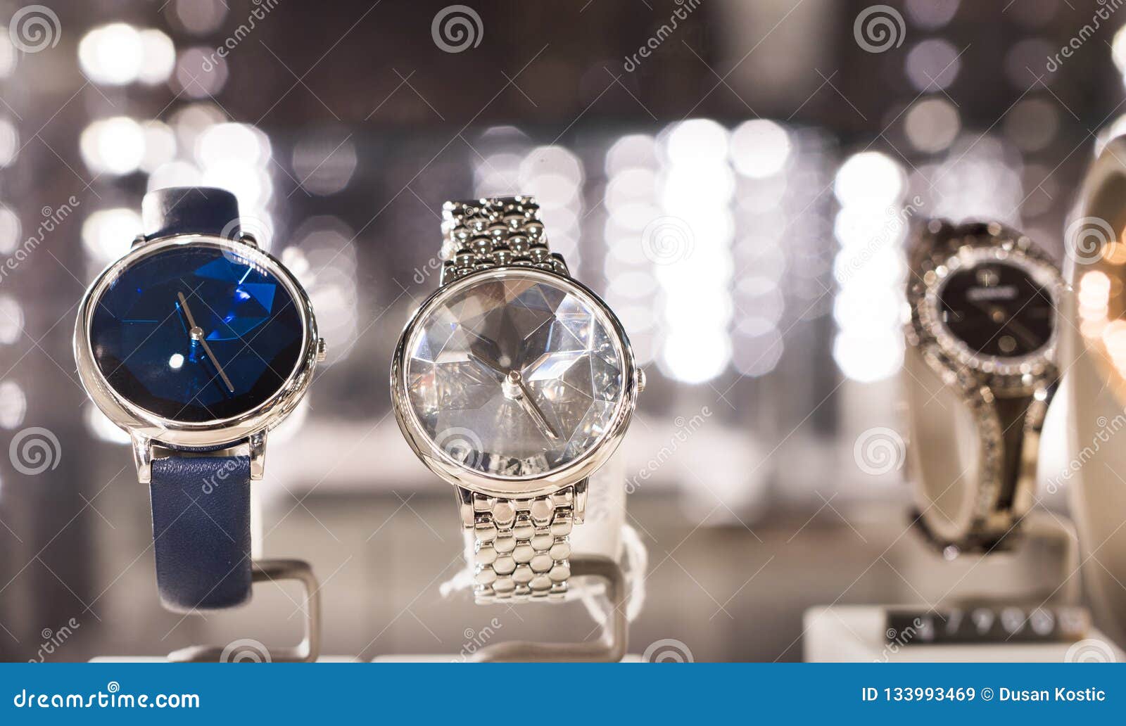 Watches in a luxury store stock image. Image of inside - 133993469