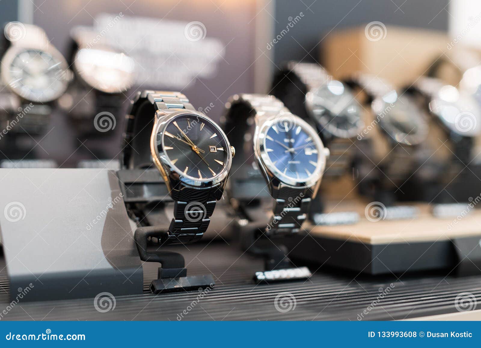 Watches in a luxury store stock photo. Image of elegance - 133993608