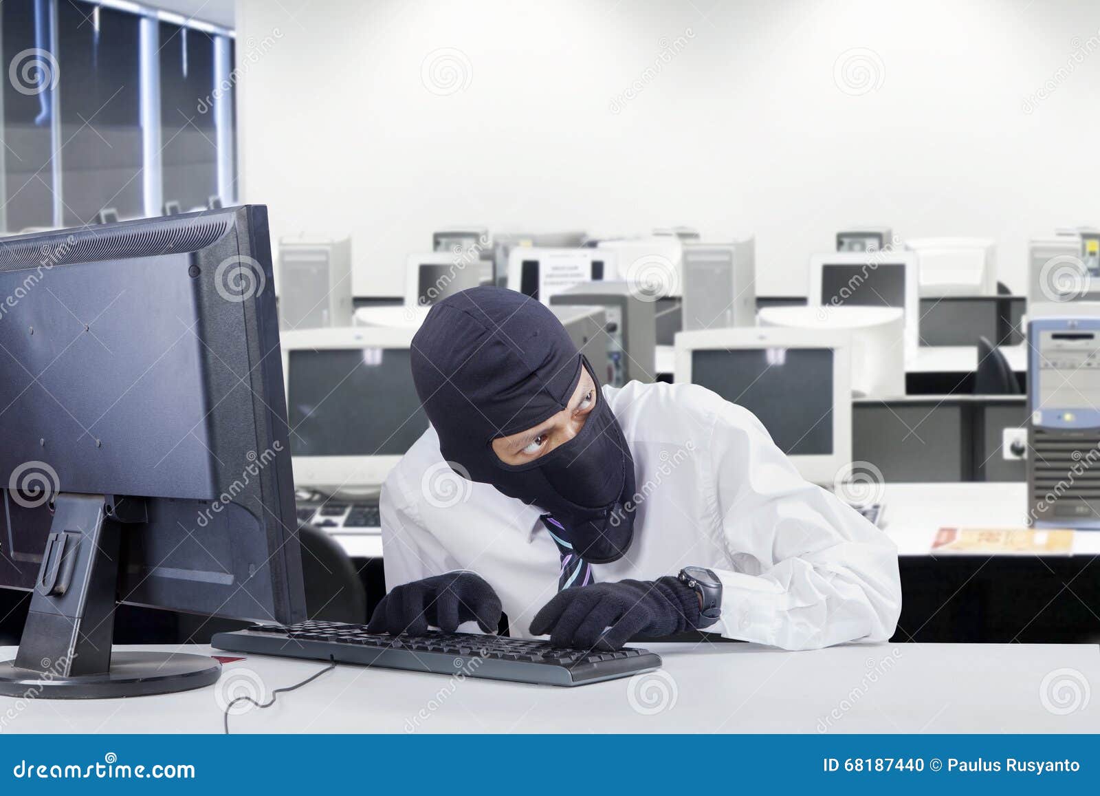 Watchful Robber Hacking Computer in Office Stock Photo - Image of ...