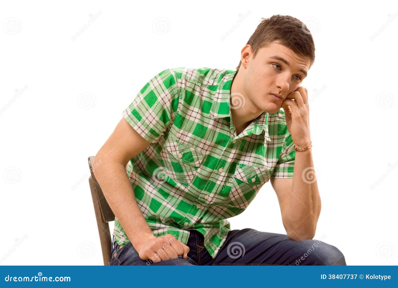 Watchful Young Man Sitting Thinking Stock Image - Image of shirt ...