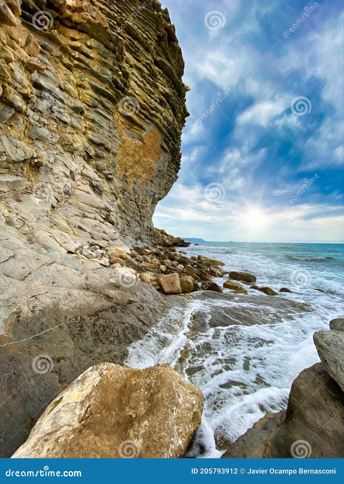 Sunrise on the Beautiful Beach with Rocks and a Cloudy Day Stock Photo ...