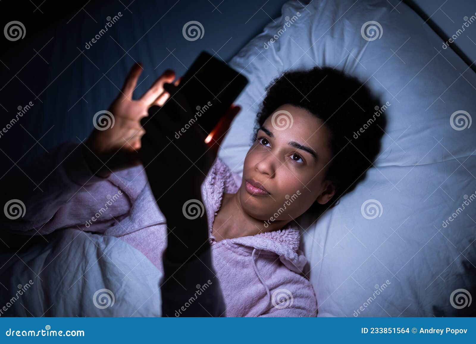 Watching Cell Phone stock photo. Image of sleep, holding - 233851564