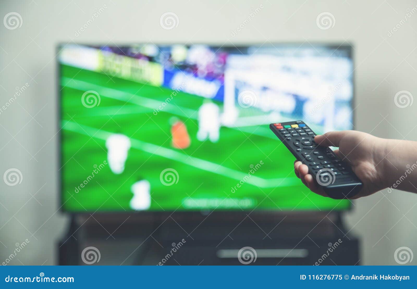 Watching Football Match on Tv with Remote Controller. Stock Image ...