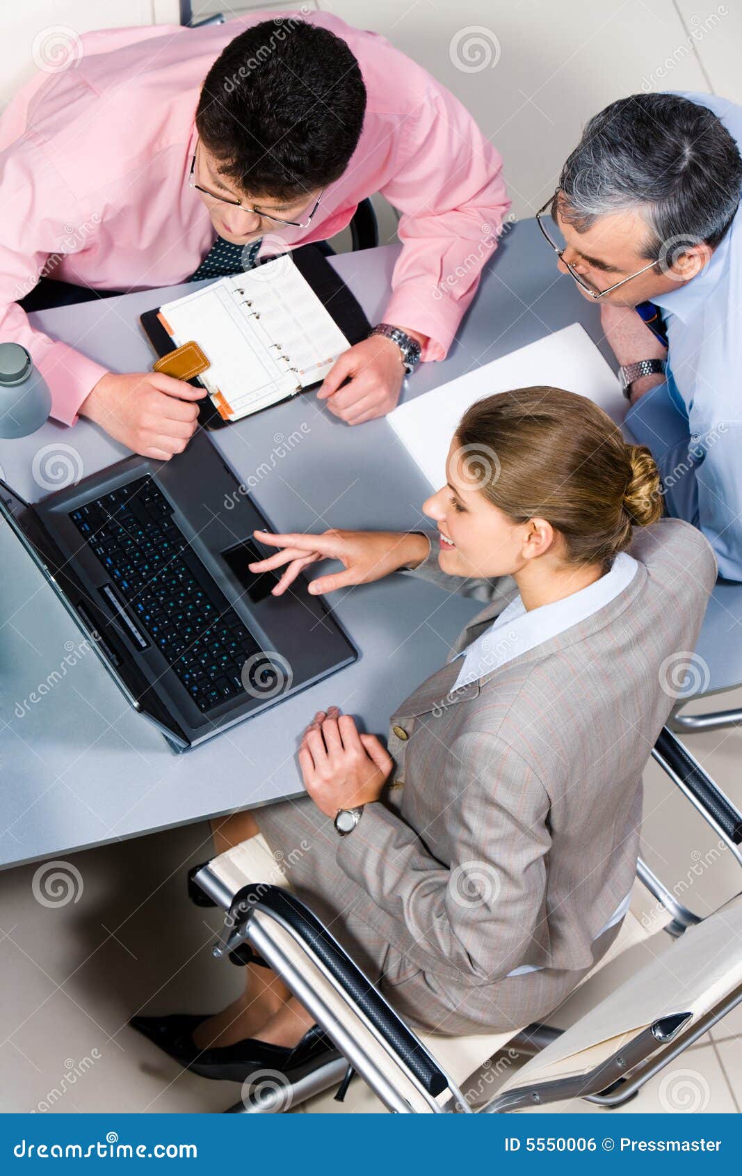 Watching at laptop stock photo. Image of associate, colleague - 5550006