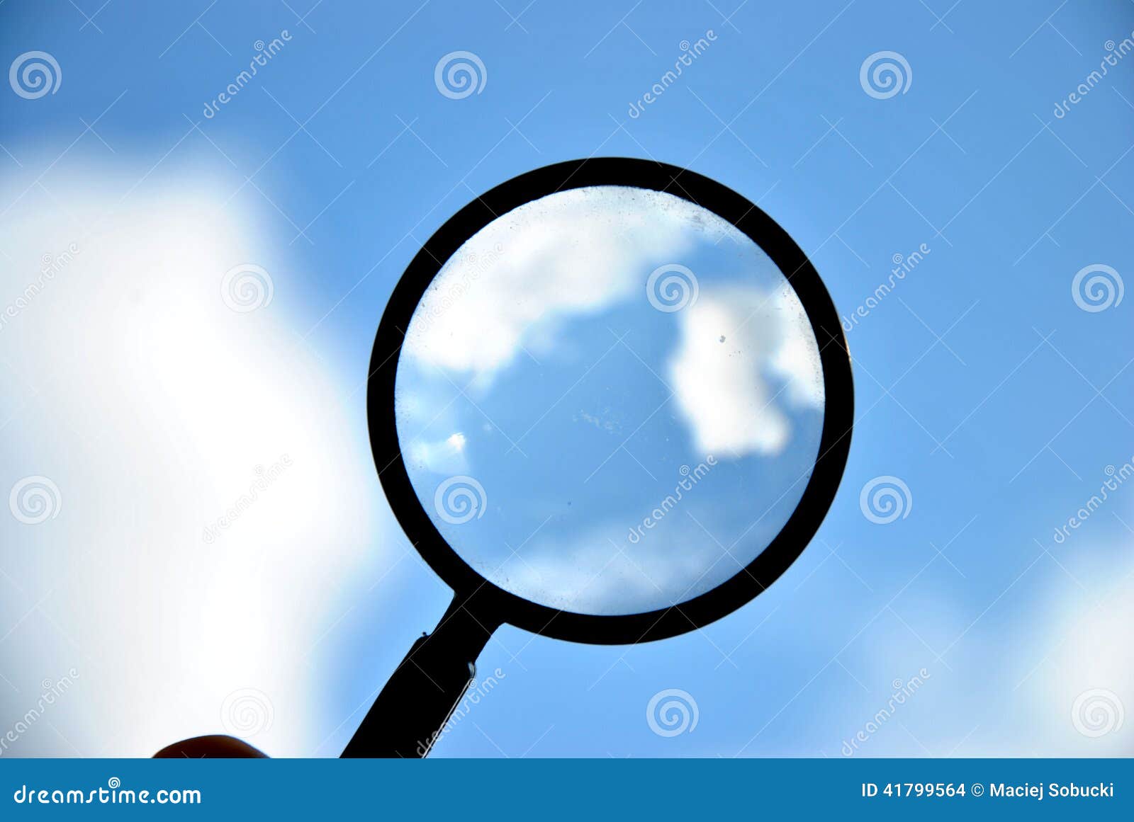 Watching by magnifier stock photo. Image of hand, light - 41799564