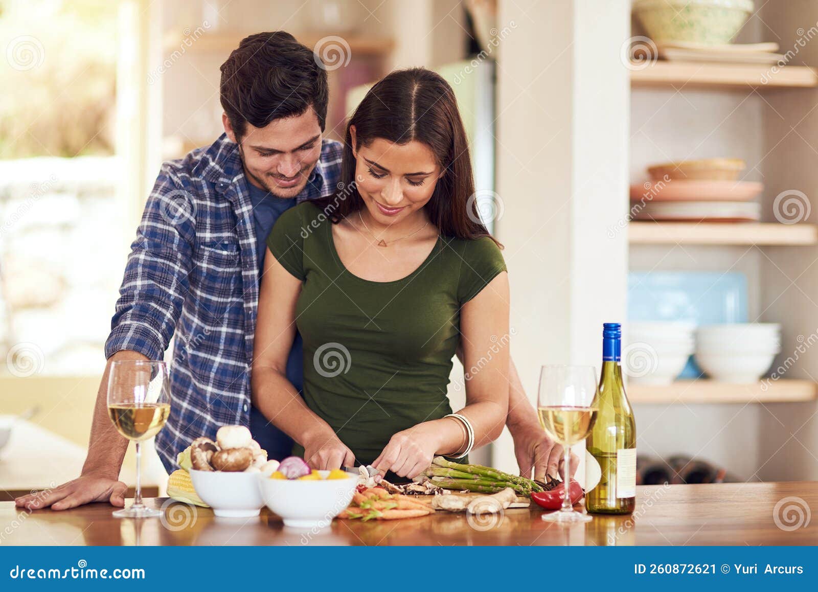 Watching the Master at Work. a Young Couple Preparing Dinner Together ...