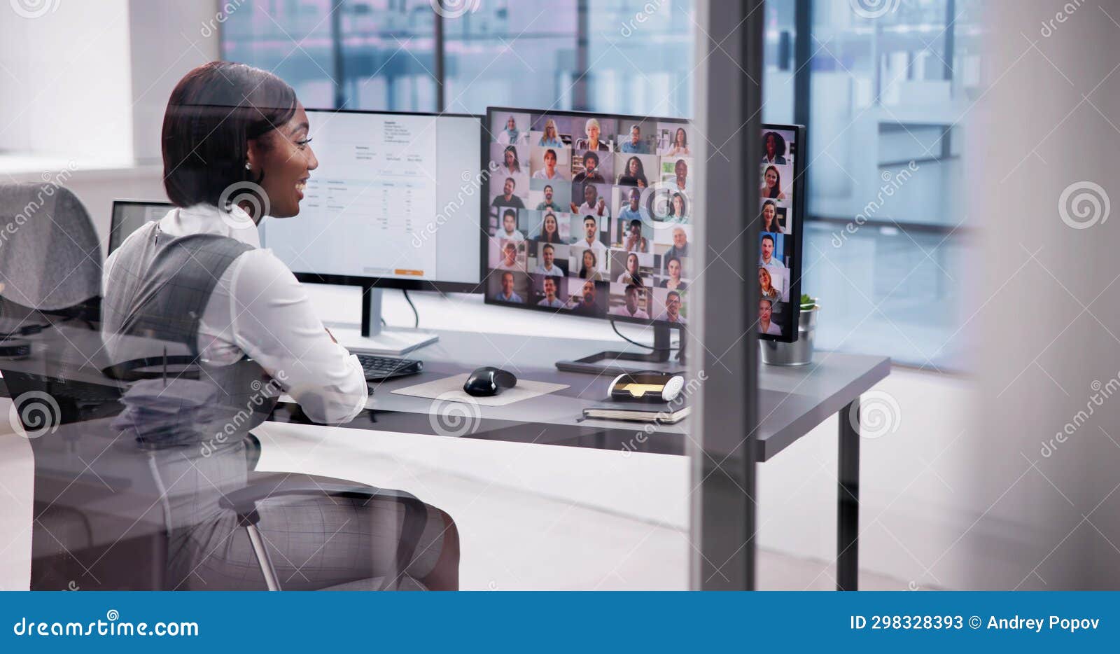 Watching Multiple Office Computer Monitors - ELearning Stock Image ...