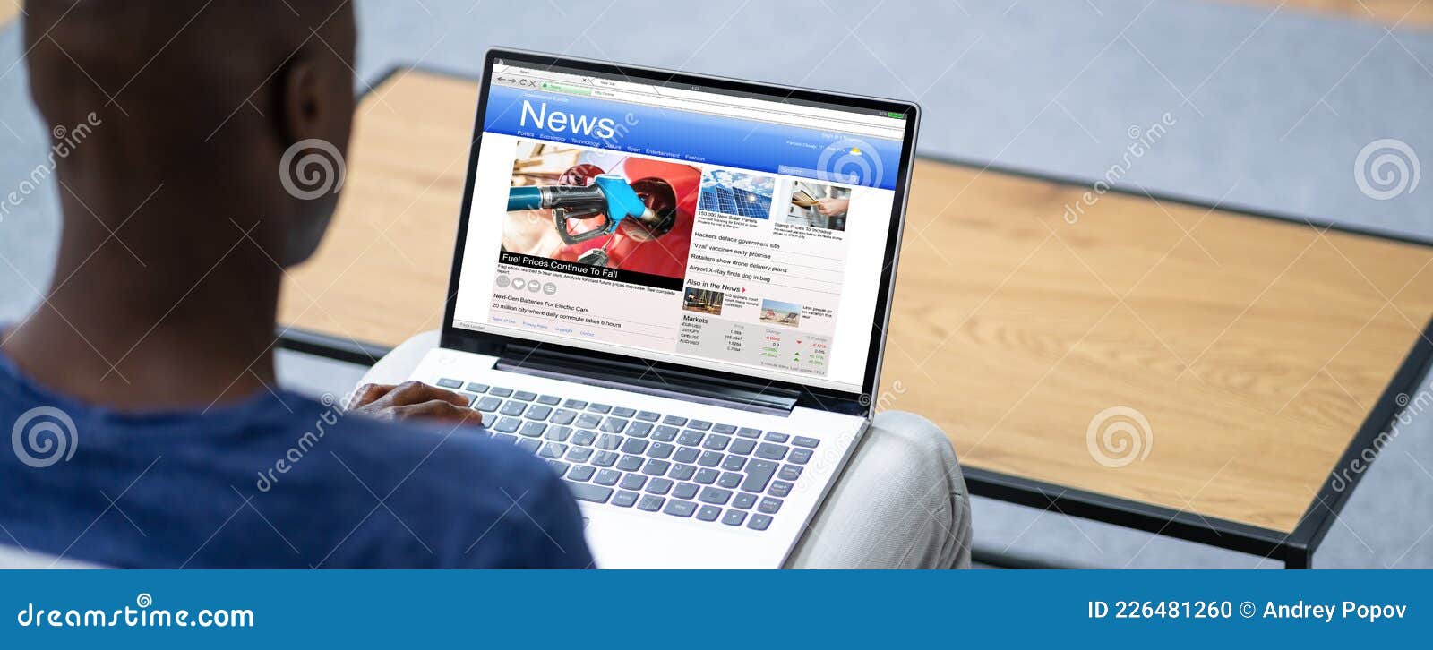 Watching Online News Article on Computer Stock Photo - Image of ...