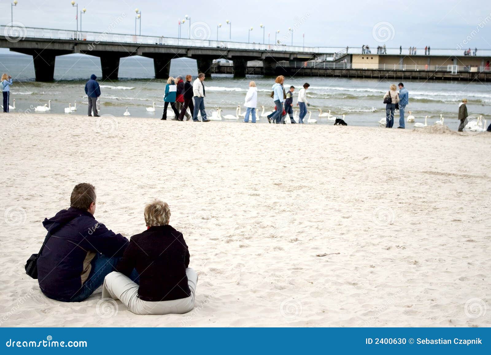 Watching people on beach. stock photo. Image of background - 2400630