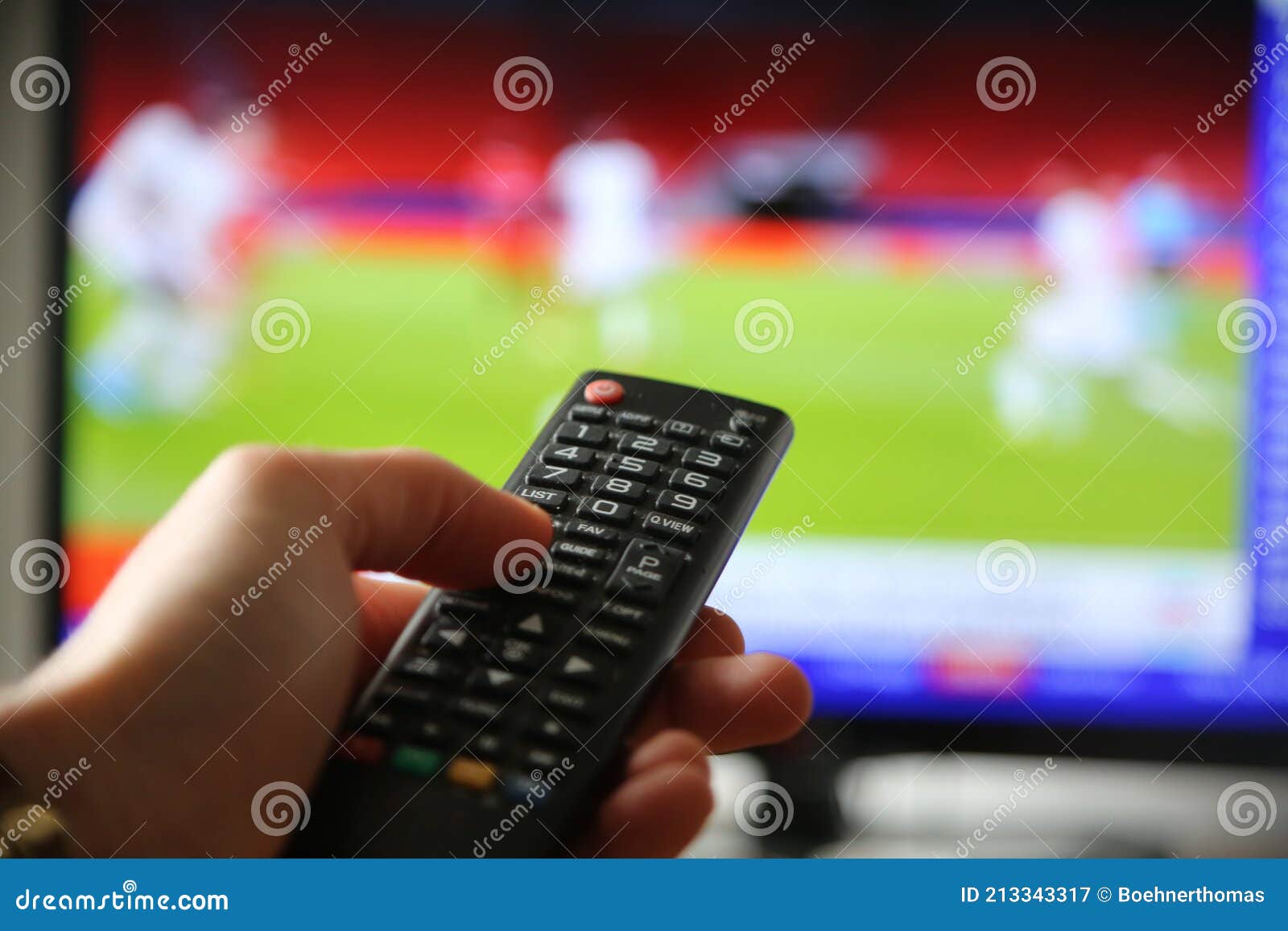 Watching soccer on tv stock image. Image of computer - 213343317