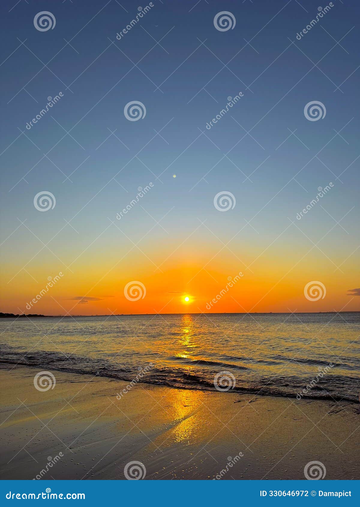 Watching the Sunset on the Beach, with the Sky Blue Stock Photo - Image ...