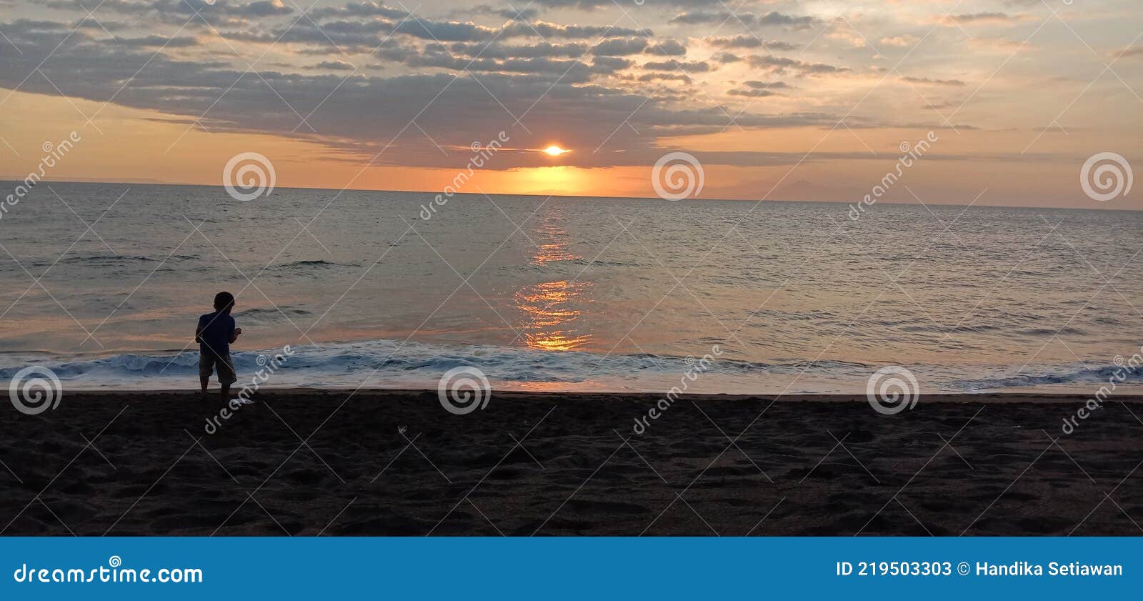 Watching the Sunset on a Beach Stock Image - Image of sunrise, beach ...