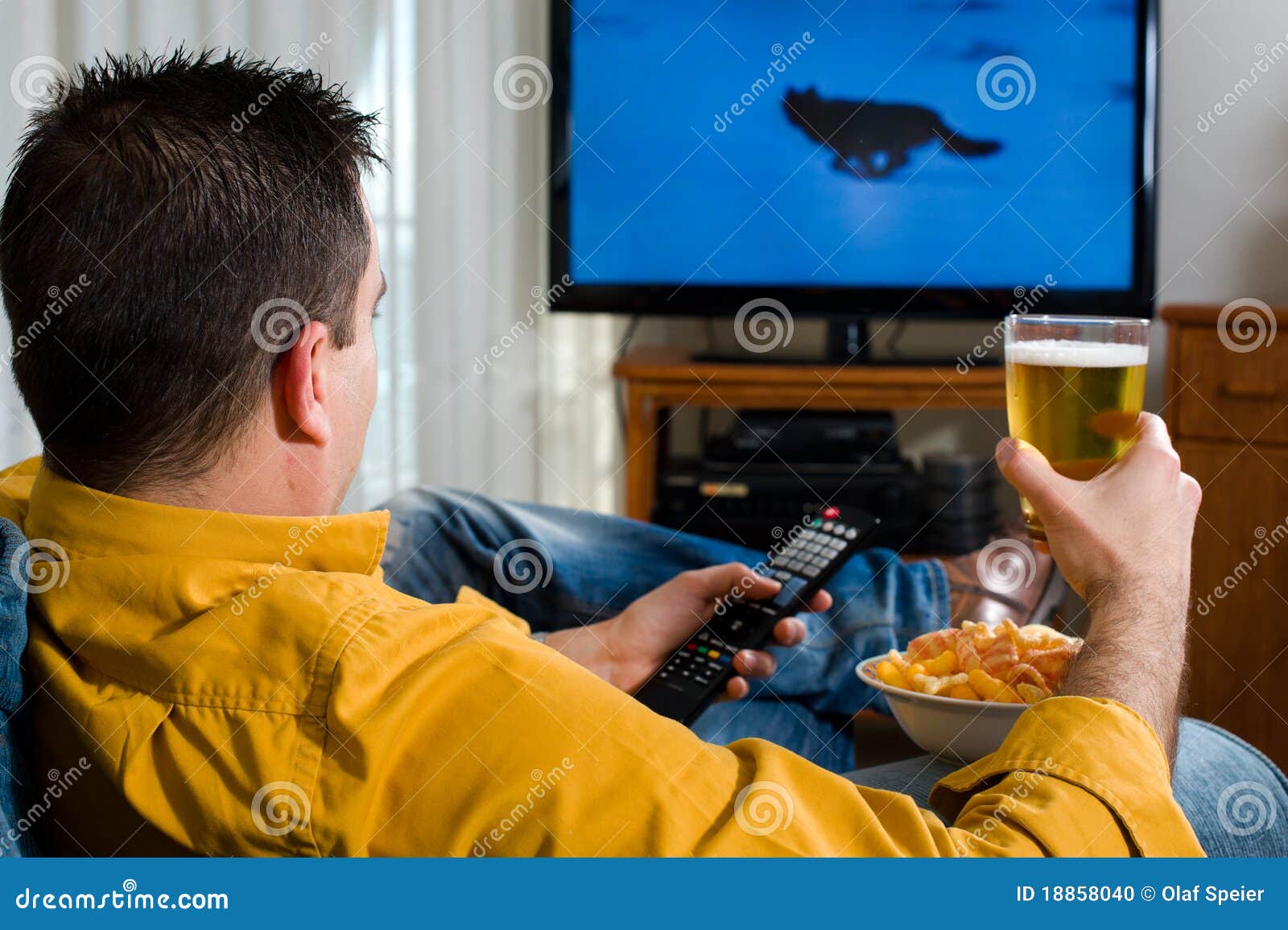 Watching television stock photo. Image of pint, sitting - 18858040