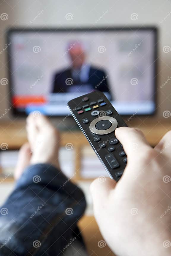 Watching tv stock image. Image of display, channel, programme - 14202915