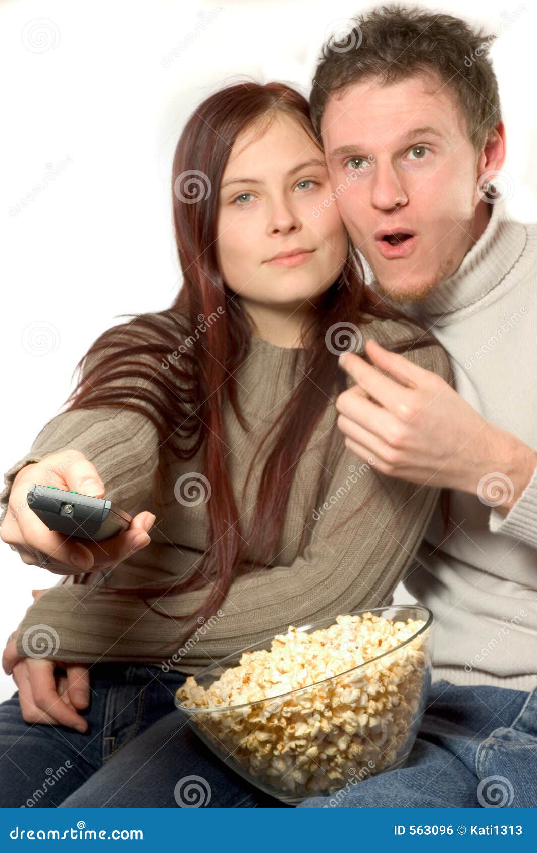 Watching tv stock photo. Image of enjoyment, enjoys, control - 563096