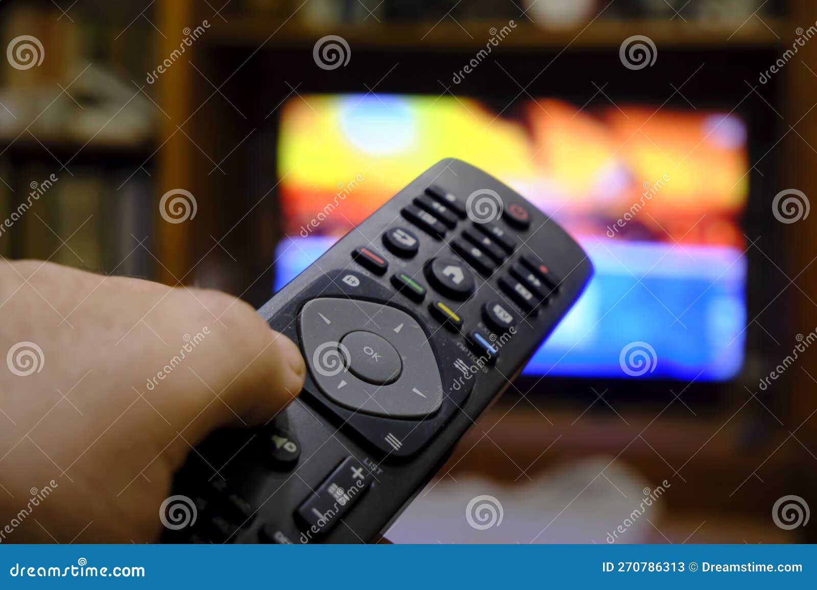 Watching TV News stock image. Image of lighting, black - 270786313