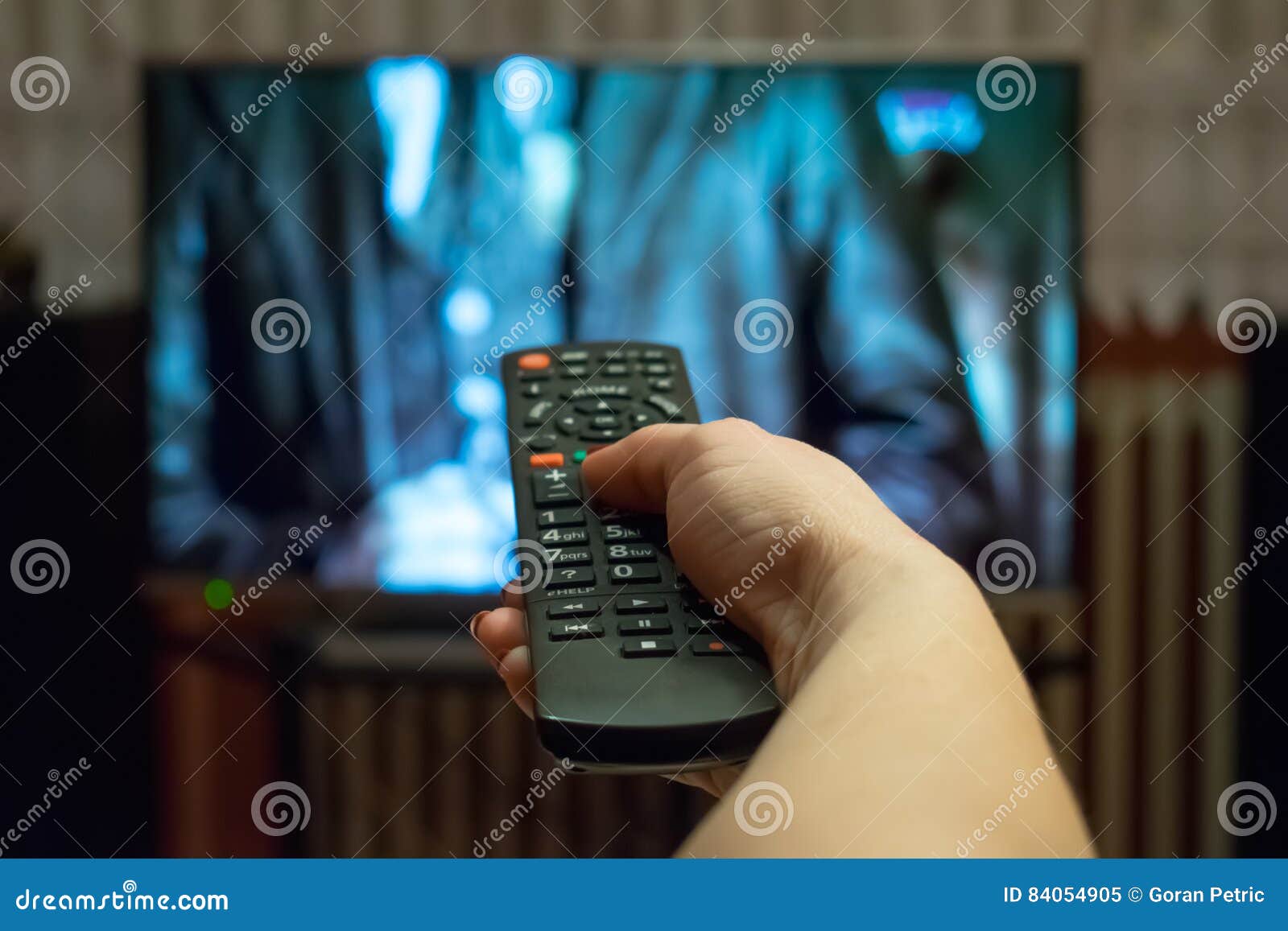 Watching Tv and Using Remote Control Stock Image - Image of news ...