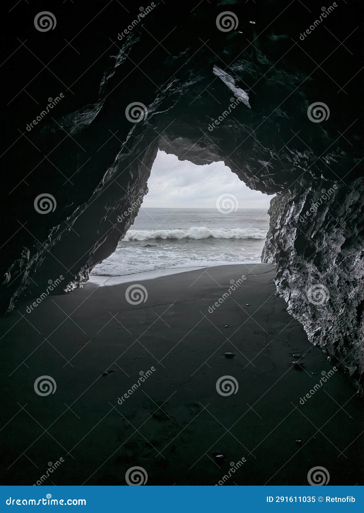 Watching the Waves from the Cave Stock Image - Image of cave, waves ...